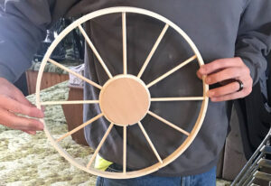 DIY Farmhouse Wagon Wheel Clock from Embroidery Hoops